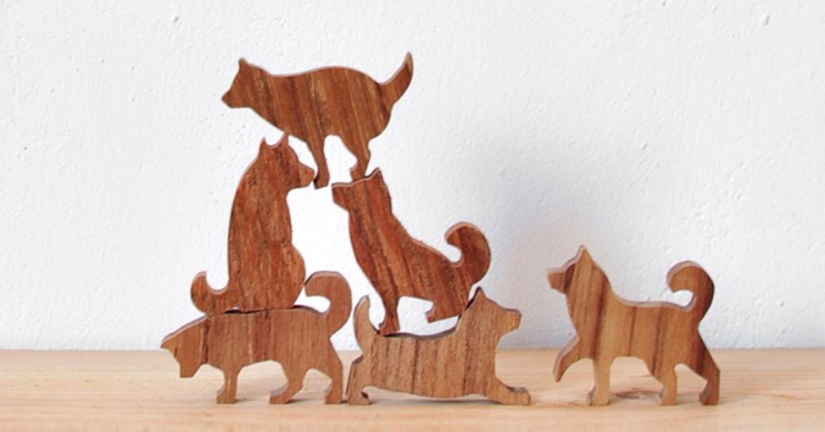 Cute Dog-Stacking Game Challenges Players To Balance Tiny Wooden Dogs ...